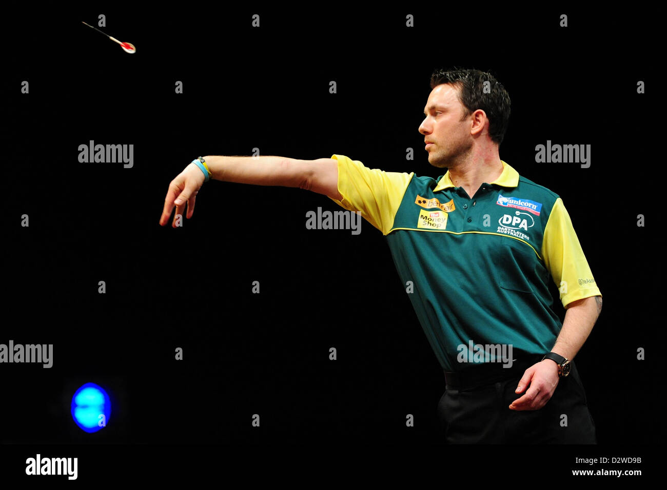 Australia's Paul Nicholson throws a dart at the 2013 Betfair World Cup ...