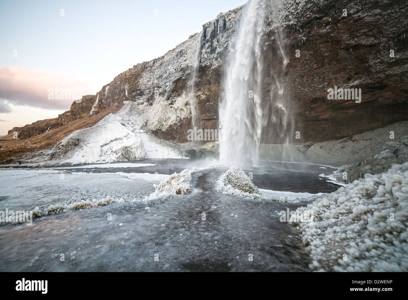 icy waterfall in winter in south west iceland Stock Photo - Alamy