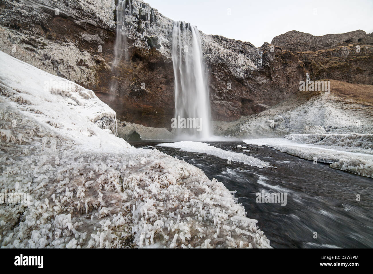 icy waterfall in winter in south west iceland Stock Photo - Alamy