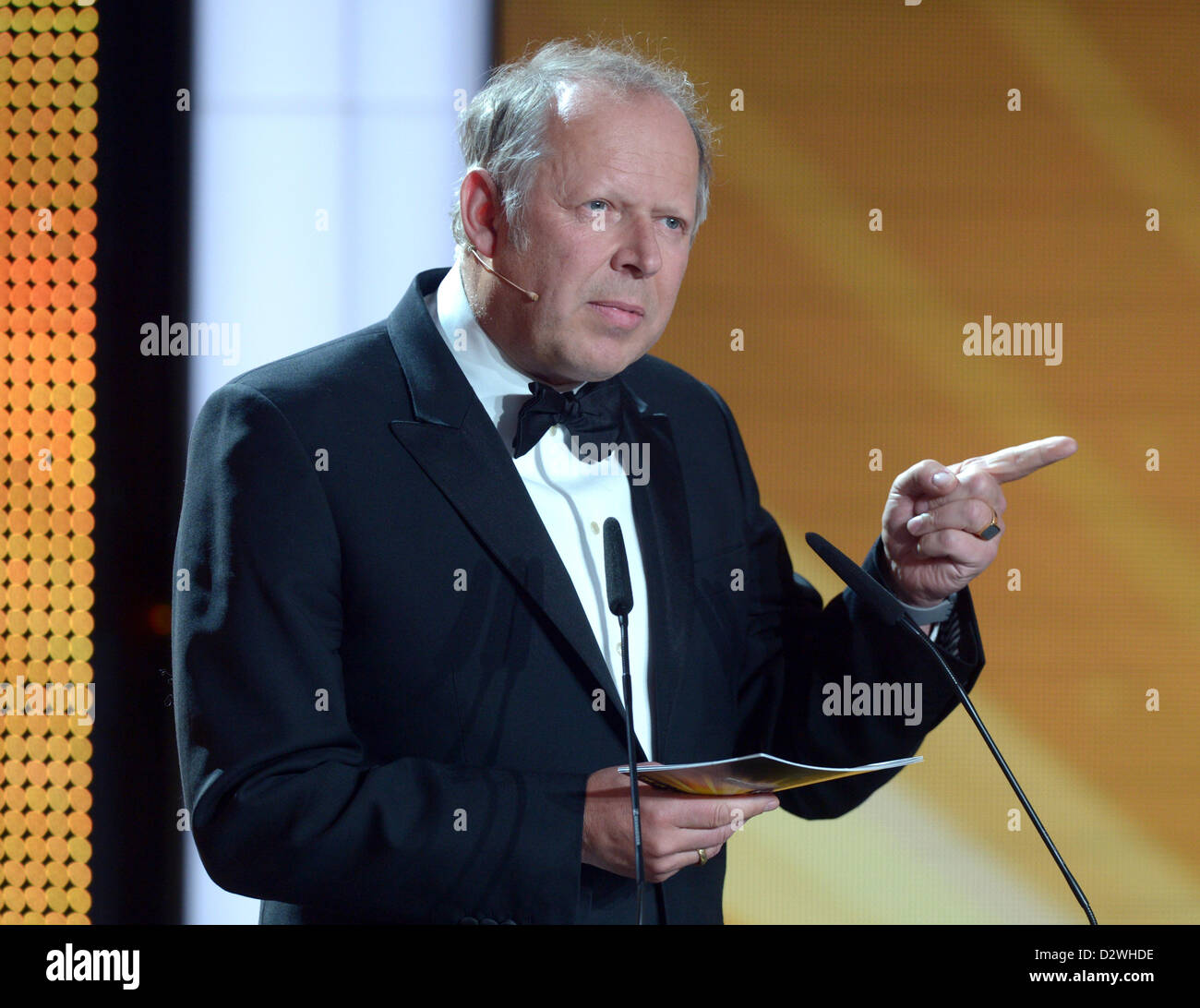 German actor Axel Milberg speaks before handing out the trophy for ...