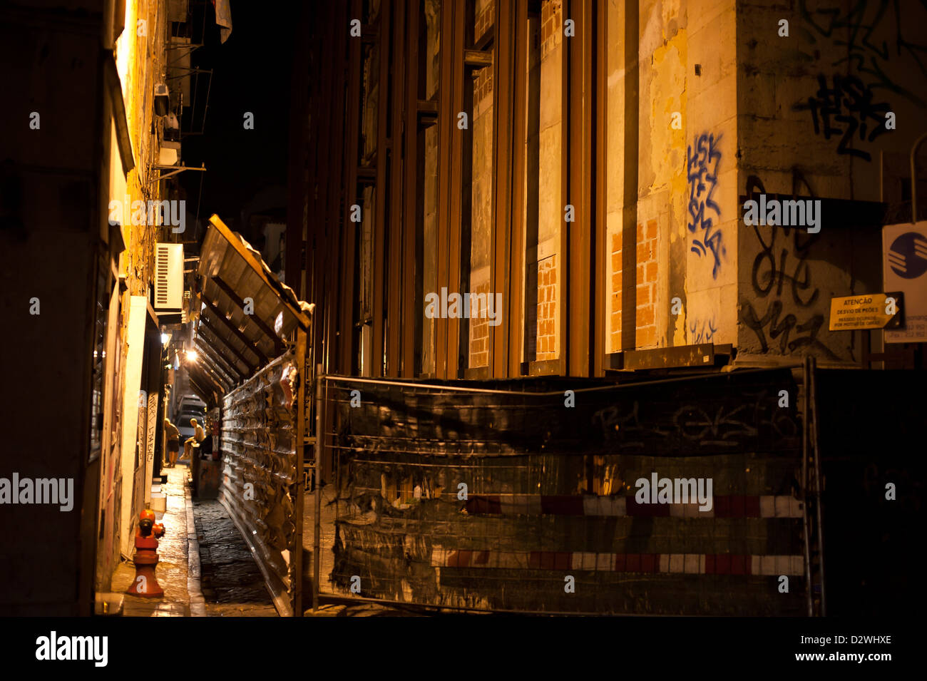 Lisbon back alley at night Stock Photo - Alamy