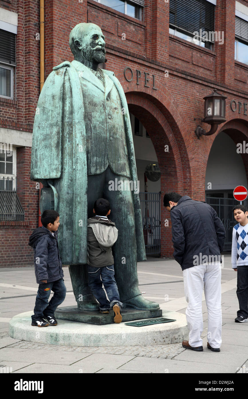 Russelsheim, Germany, children in Adam Opel statue outside the entrance ...