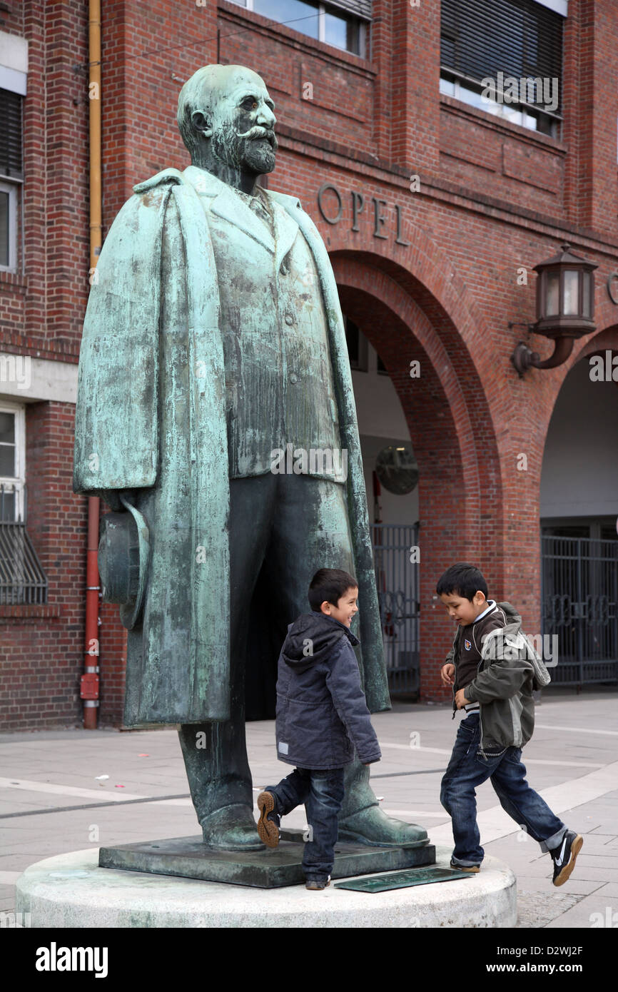 Russelsheim, Germany, children in Adam Opel statue outside the entrance ...