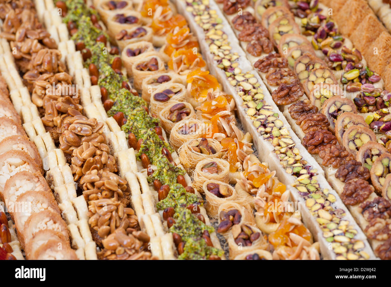 Selection of luxury oriental petit fours in rows Stock Photo - Alamy