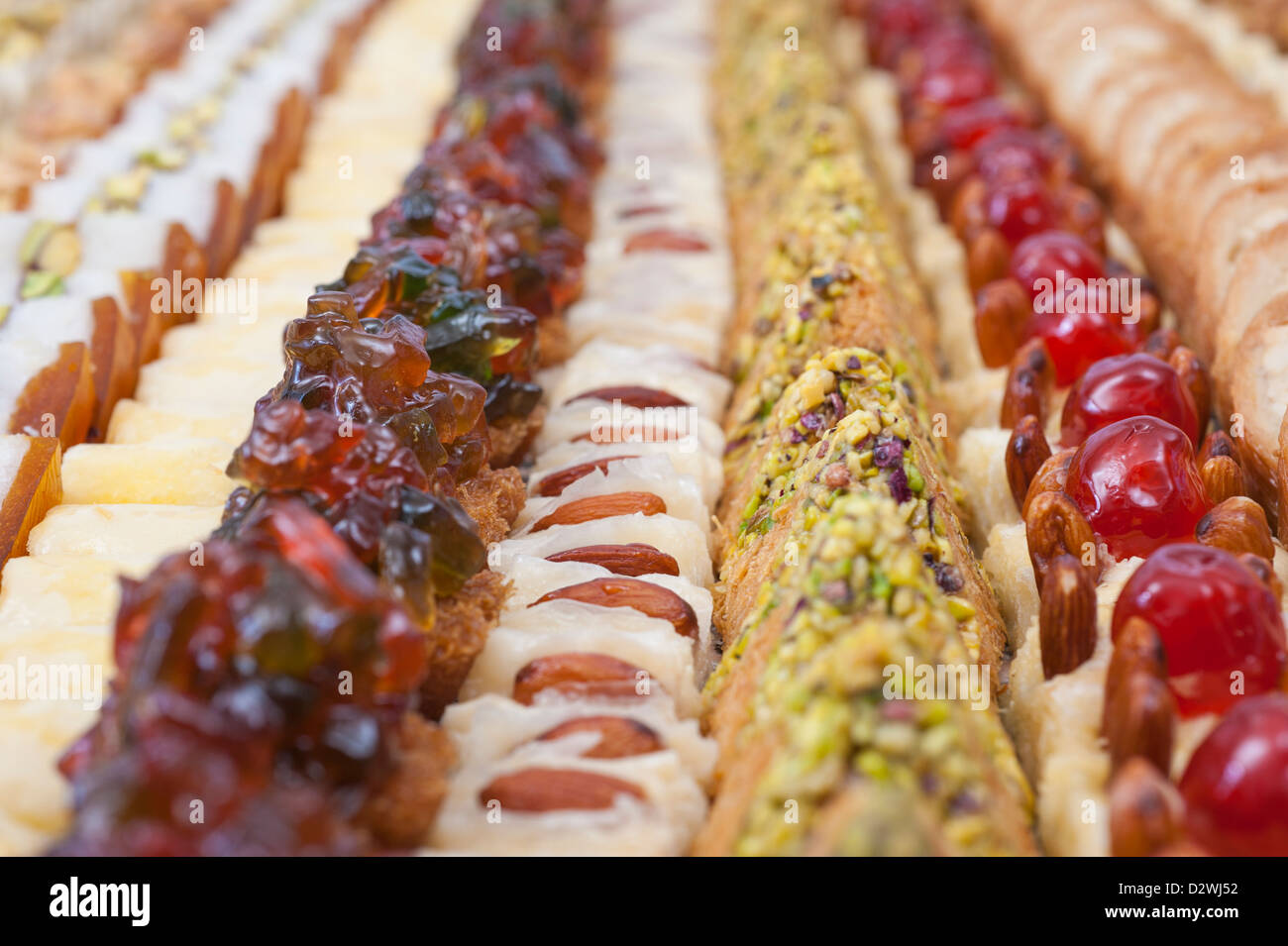 Selection of luxury oriental petit fours in rows Stock Photo - Alamy