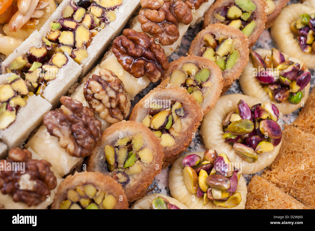 Selection of luxury oriental petit fours in rows Stock Photo - Alamy