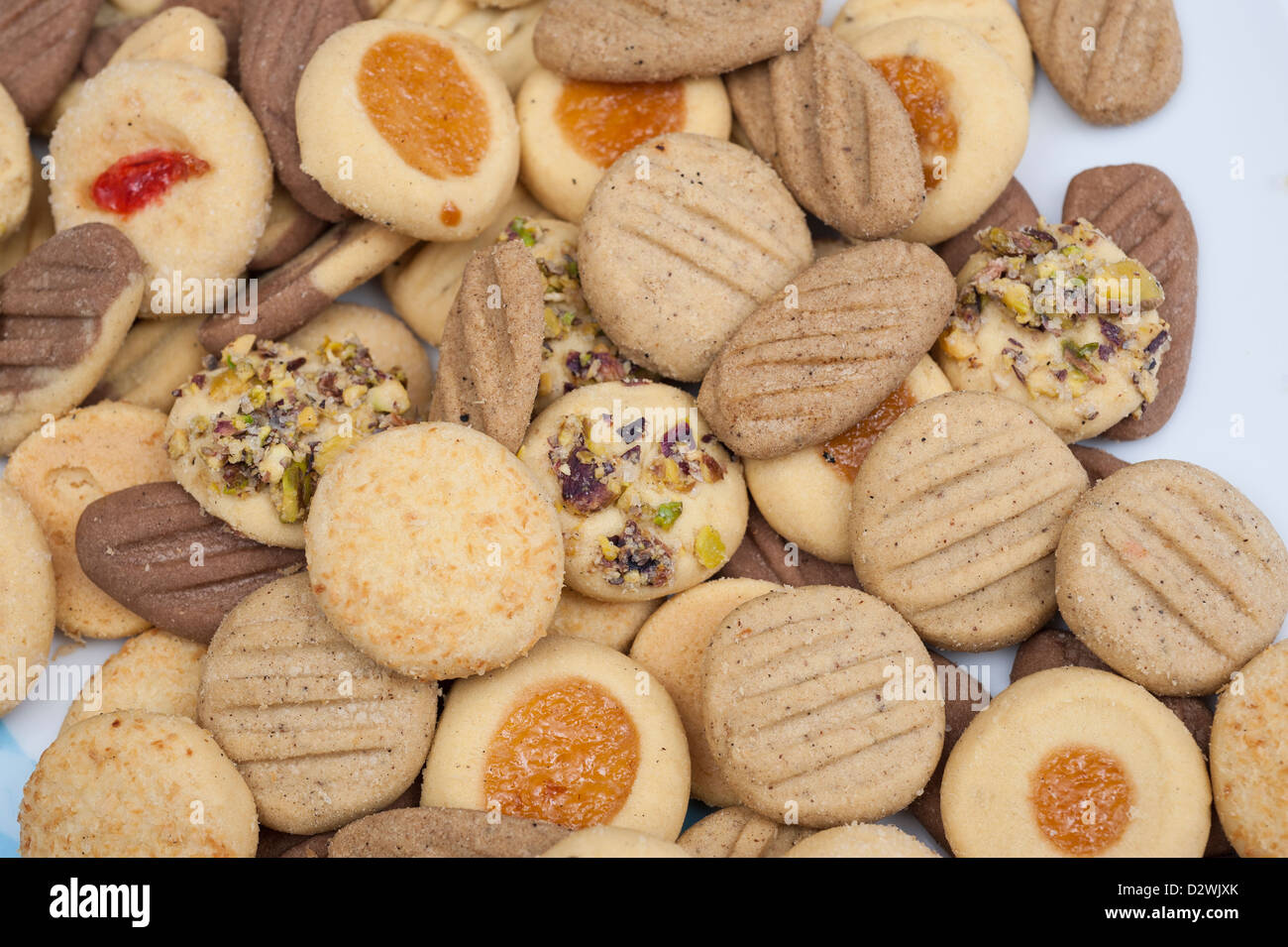 Selection of luxury oriental biscuits on a white plate Stock Photo - Alamy