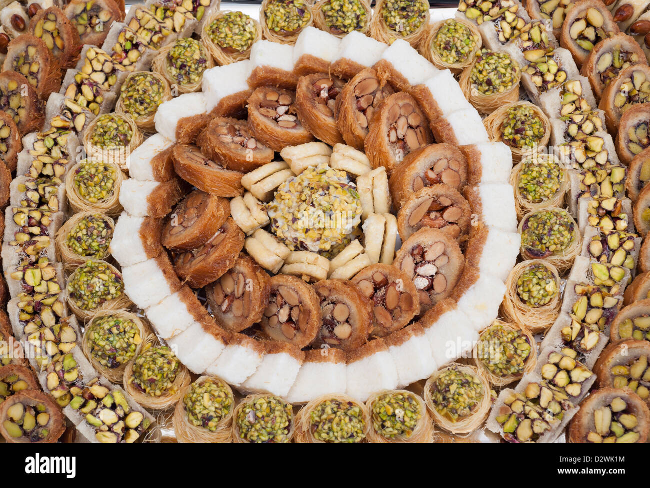 Selection of luxury oriental petit fours in circles Stock Photo - Alamy