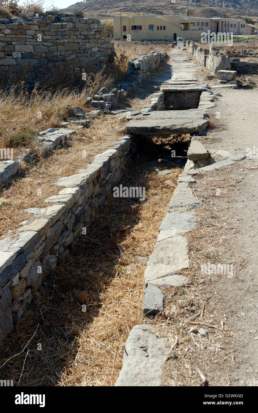 Delos . Greece. Ancient sewer waste channel that runs underneath the ...