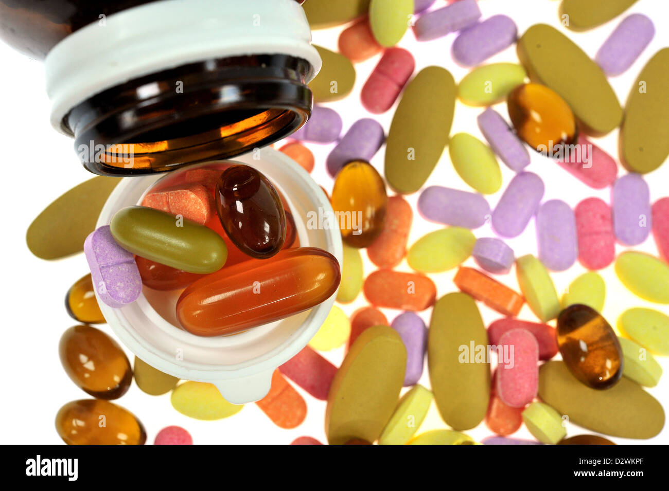 pills an pill bottle on white background Stock Photo - Alamy