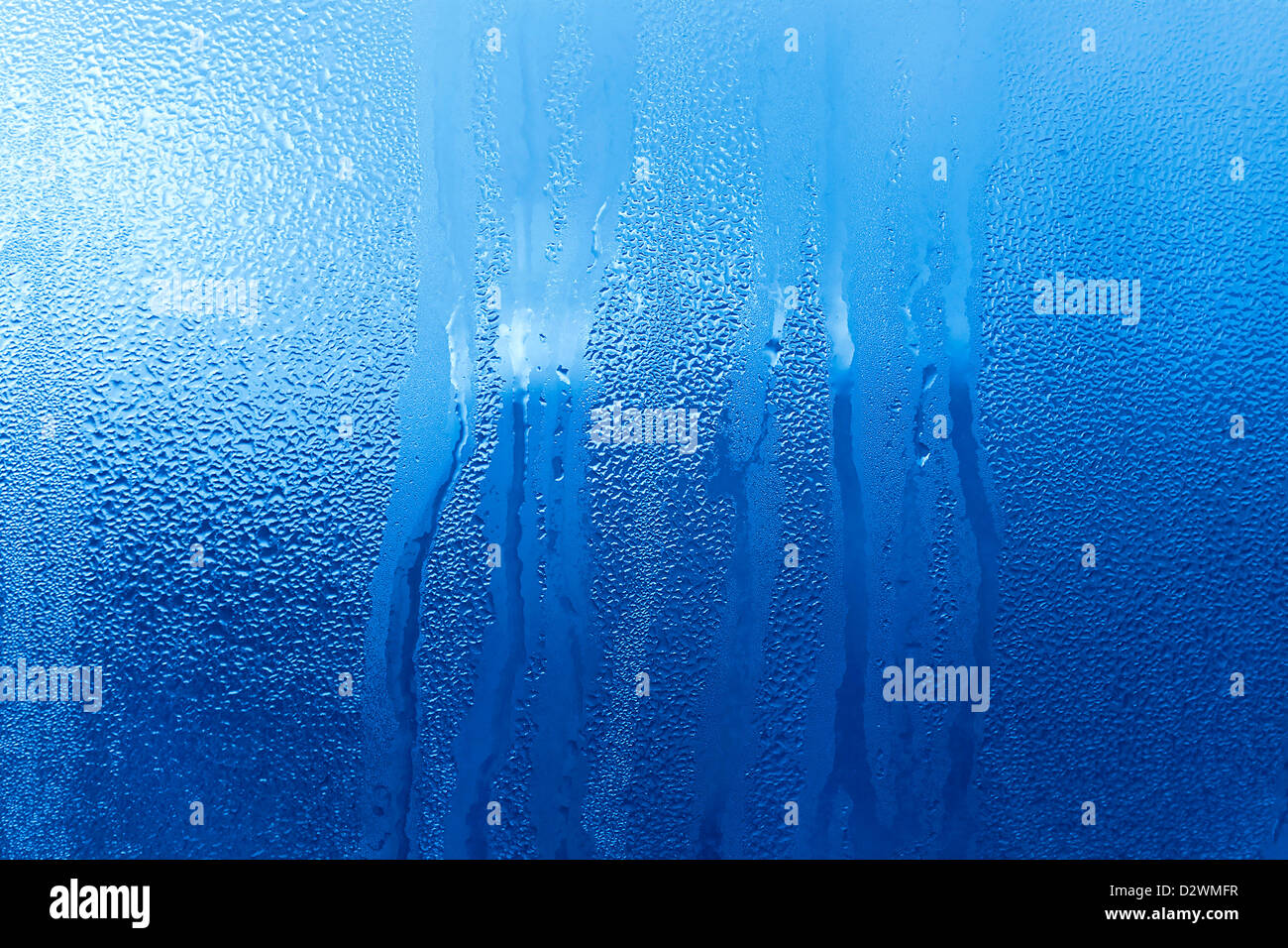 Natural water drops and sunlight on window glass Stock Photo - Alamy