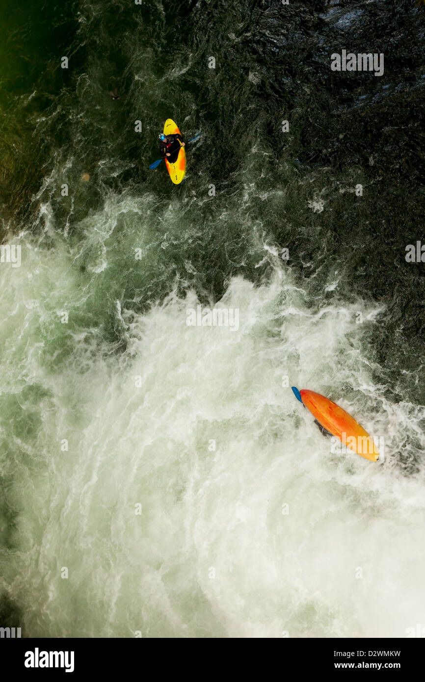 Kayaker Emerging From Underwater After A High Jump Stock Photo - Alamy