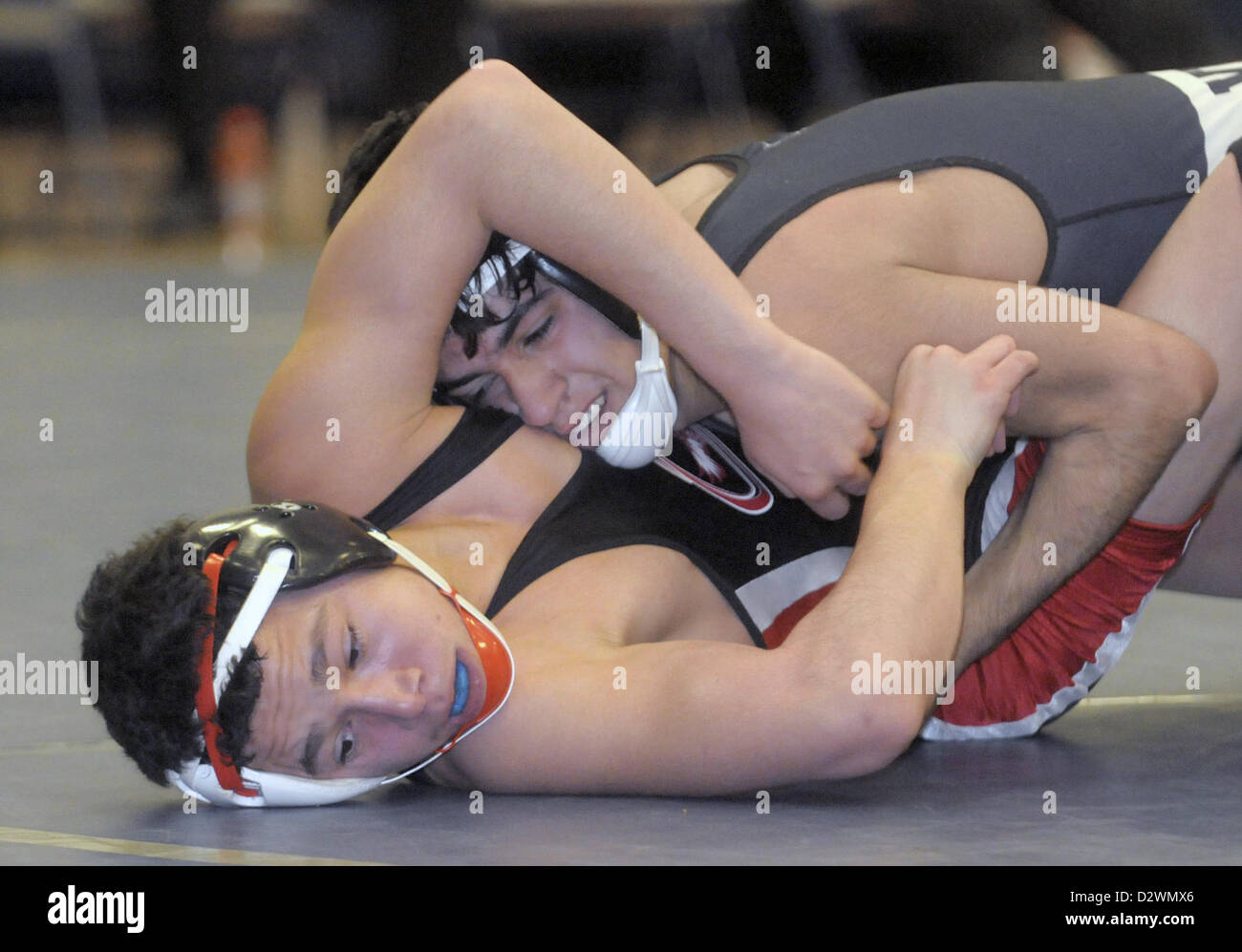 Feb. 2, 2013 - Albuquerque, NM, U.S. - Greg Sorber -- Volcano Vista's Willie Chavez, top ...