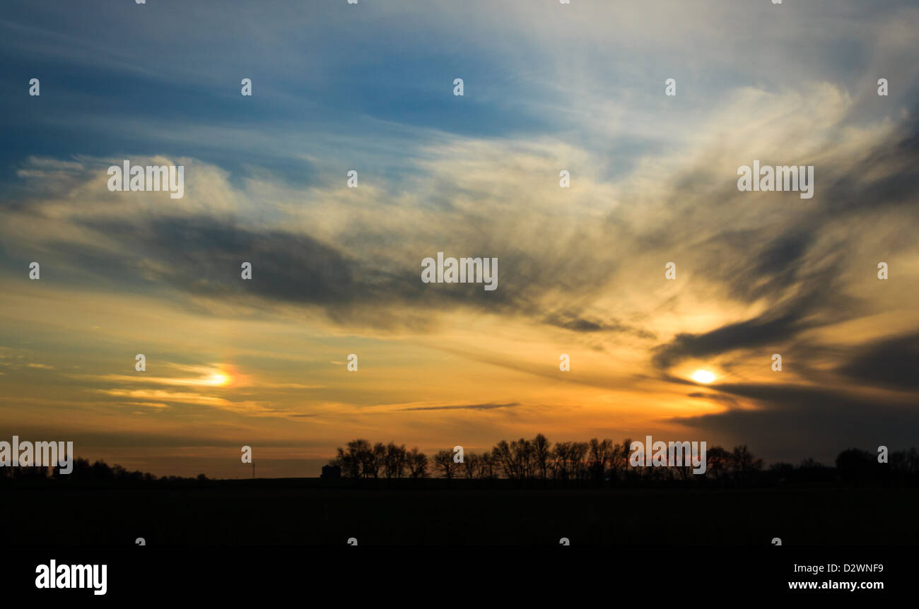 Unusual light effect in the clouds as the sun sets in Kentucky Stock ...
