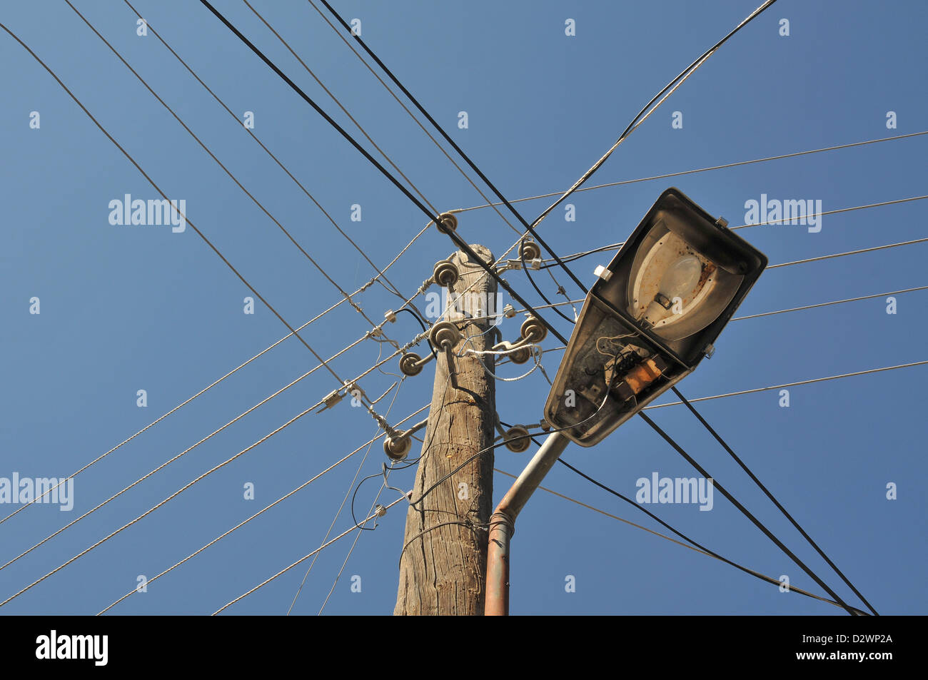 Street light with cables Stock Photo - Alamy
