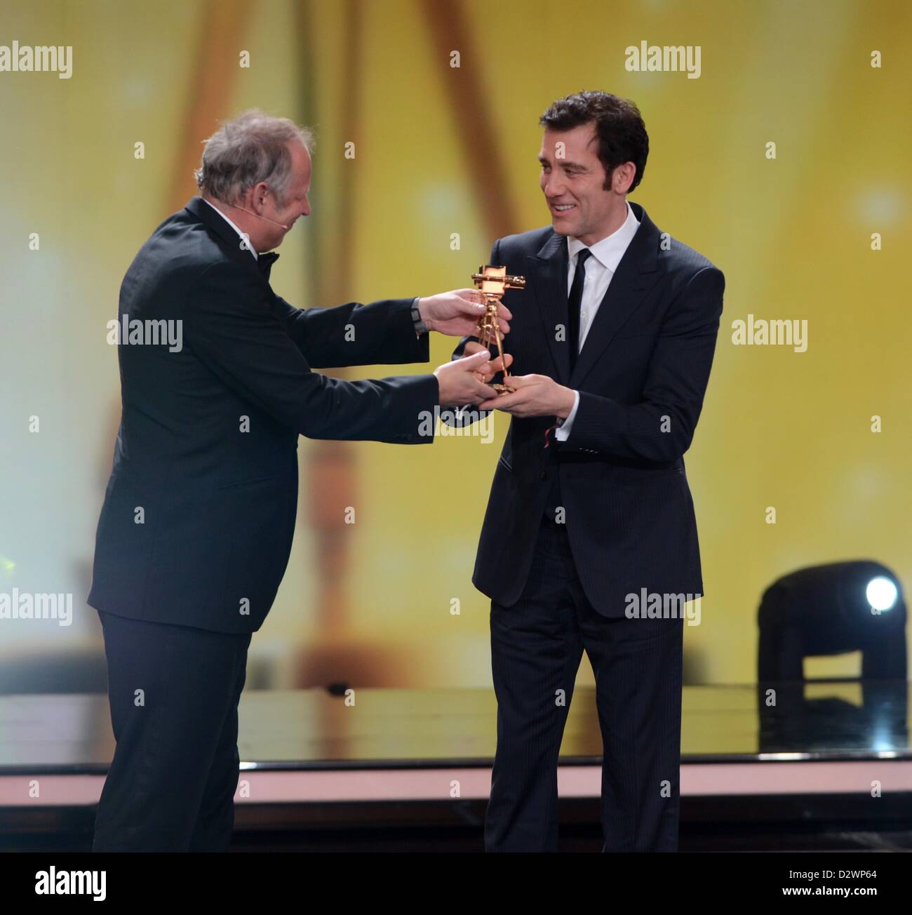 German actor Axel Milberg, actor Clive Owen L-R attend the 48th Golden ...