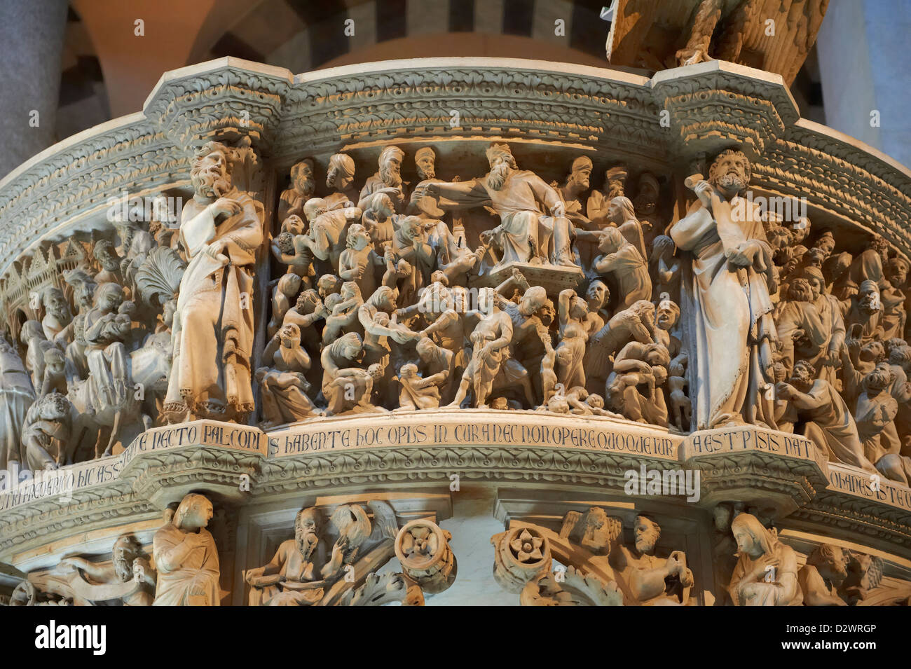 Medieval relief sculpturs on the pulpit in the interior of the Duomo ...