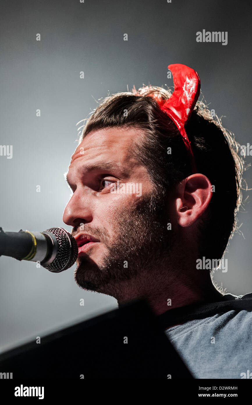 Israeli Actor Guri Alfi, with devil's horns, performs on stage Stock ...