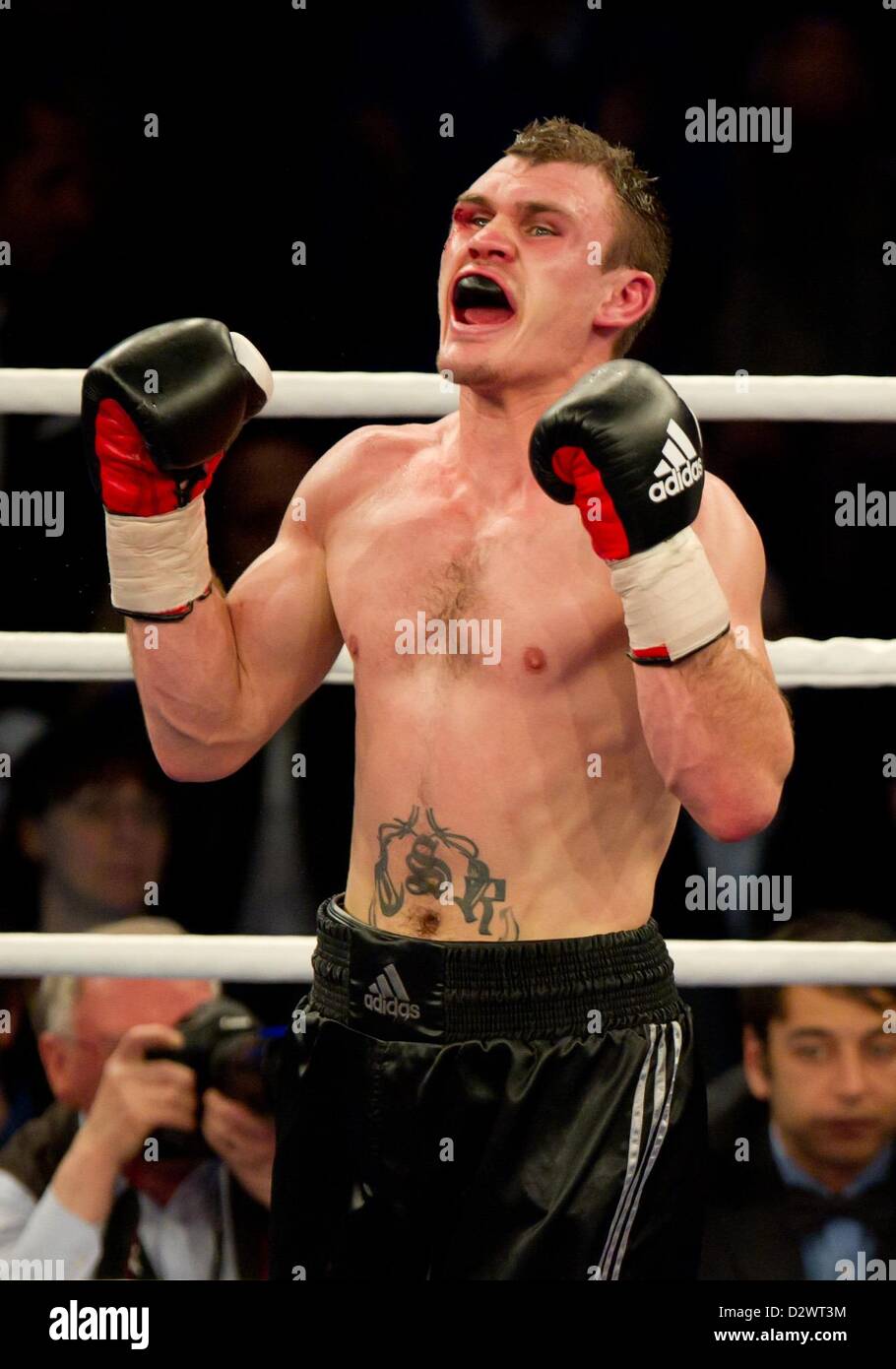 German boxing pro Robert Woge cheers after winning the fight against ...