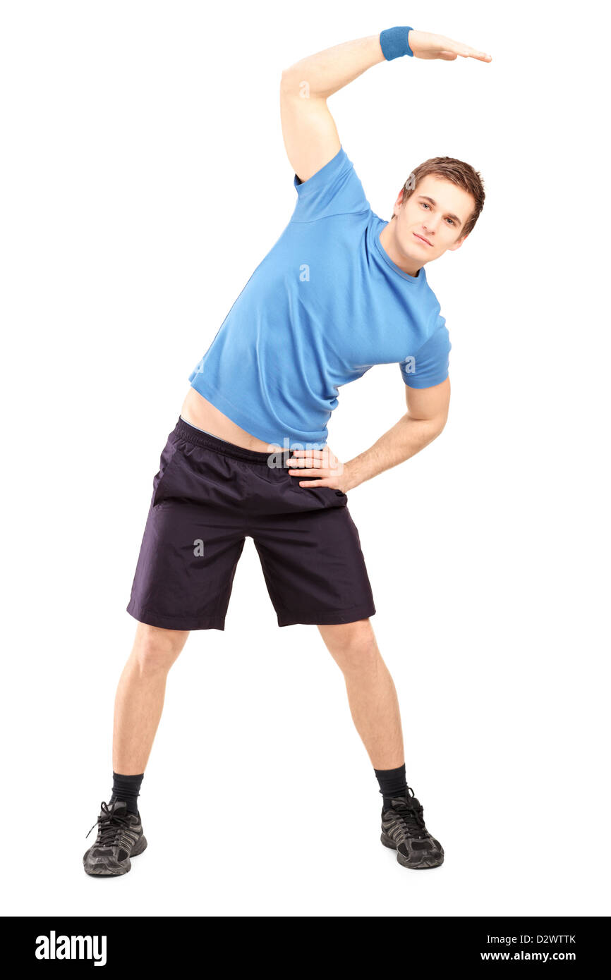 Full length portrait of a young man exercising isolated on white ...
