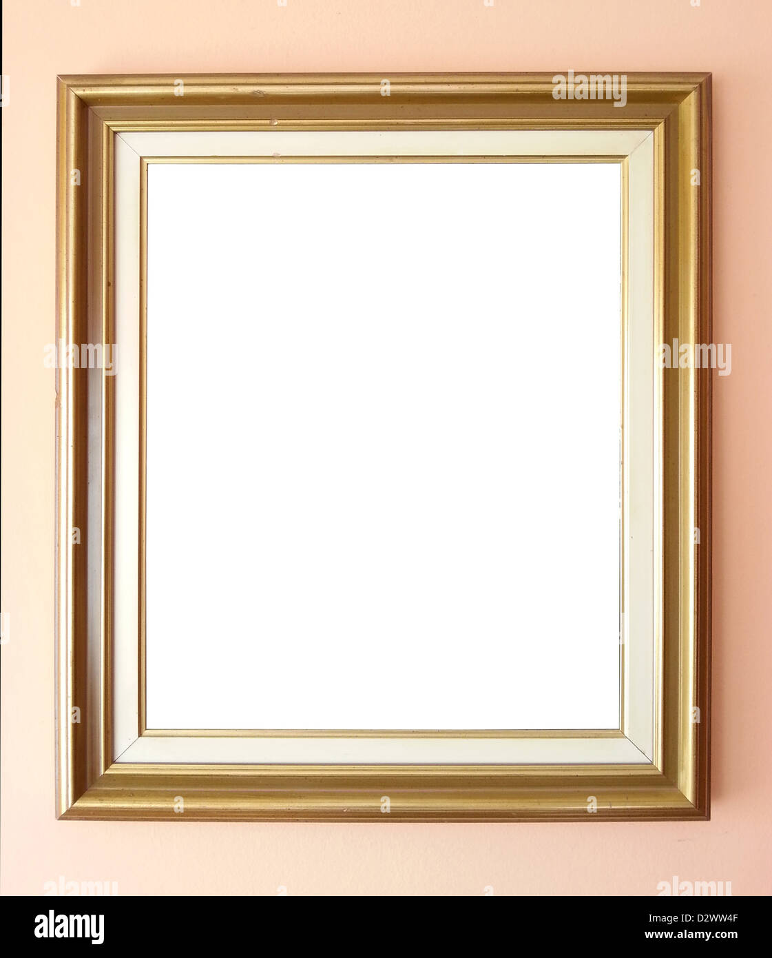 Empty golden frame on wall Stock Photo - Alamy