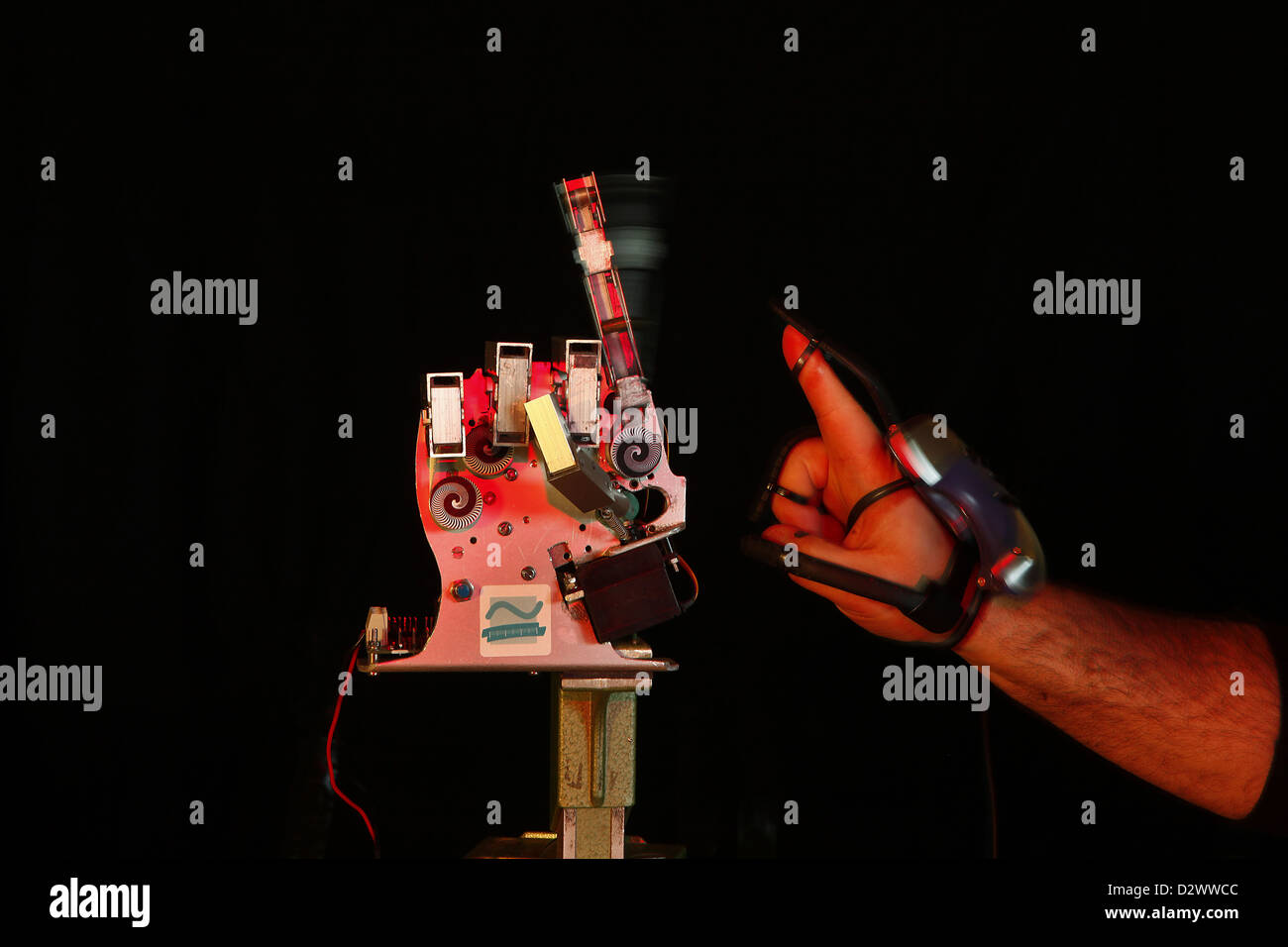 Berlin, Germany, human hand controls a bionic hand Stock Photo - Alamy