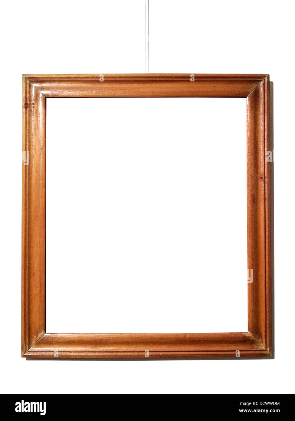 Empty wood frame hanging on white wall Stock Photo - Alamy