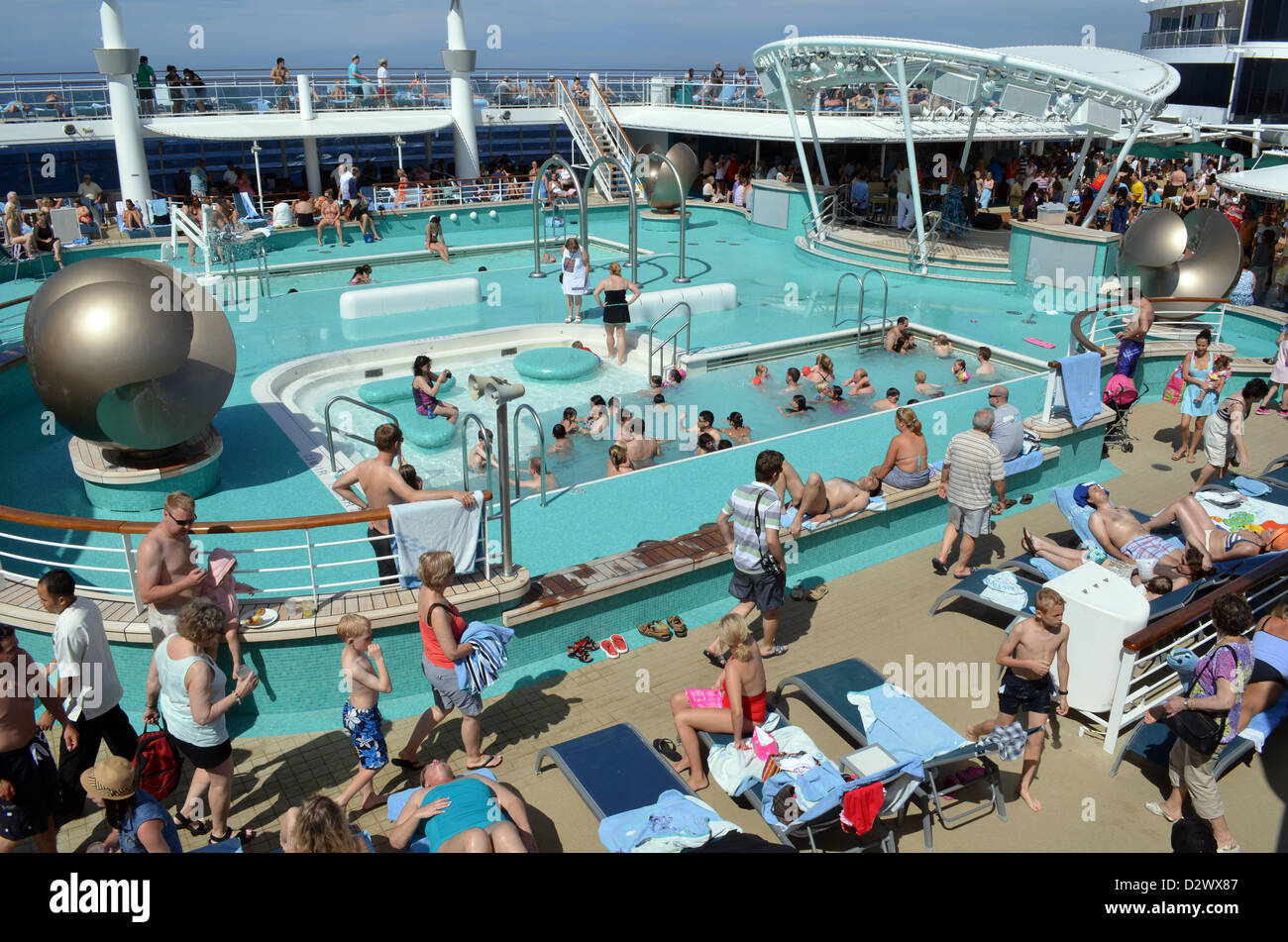 Swimming pool on the deck of the cruise ship Norwegian Epic Stock Photo ...