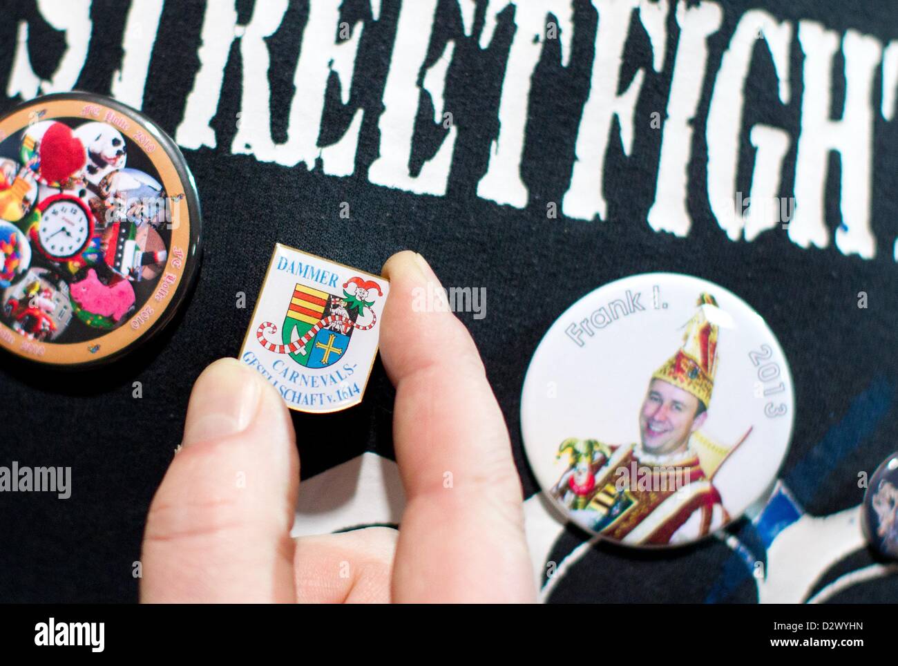 The carnival button shows the emblem of the local carnival society ...