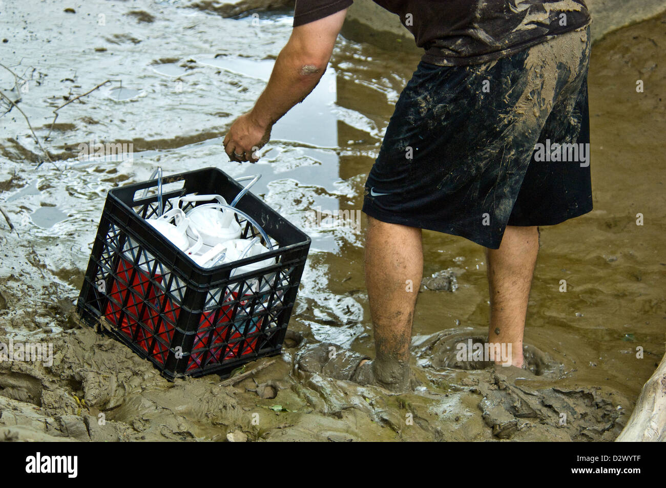Team captain slogging through the mud at The Texas Water Safari prelim ...