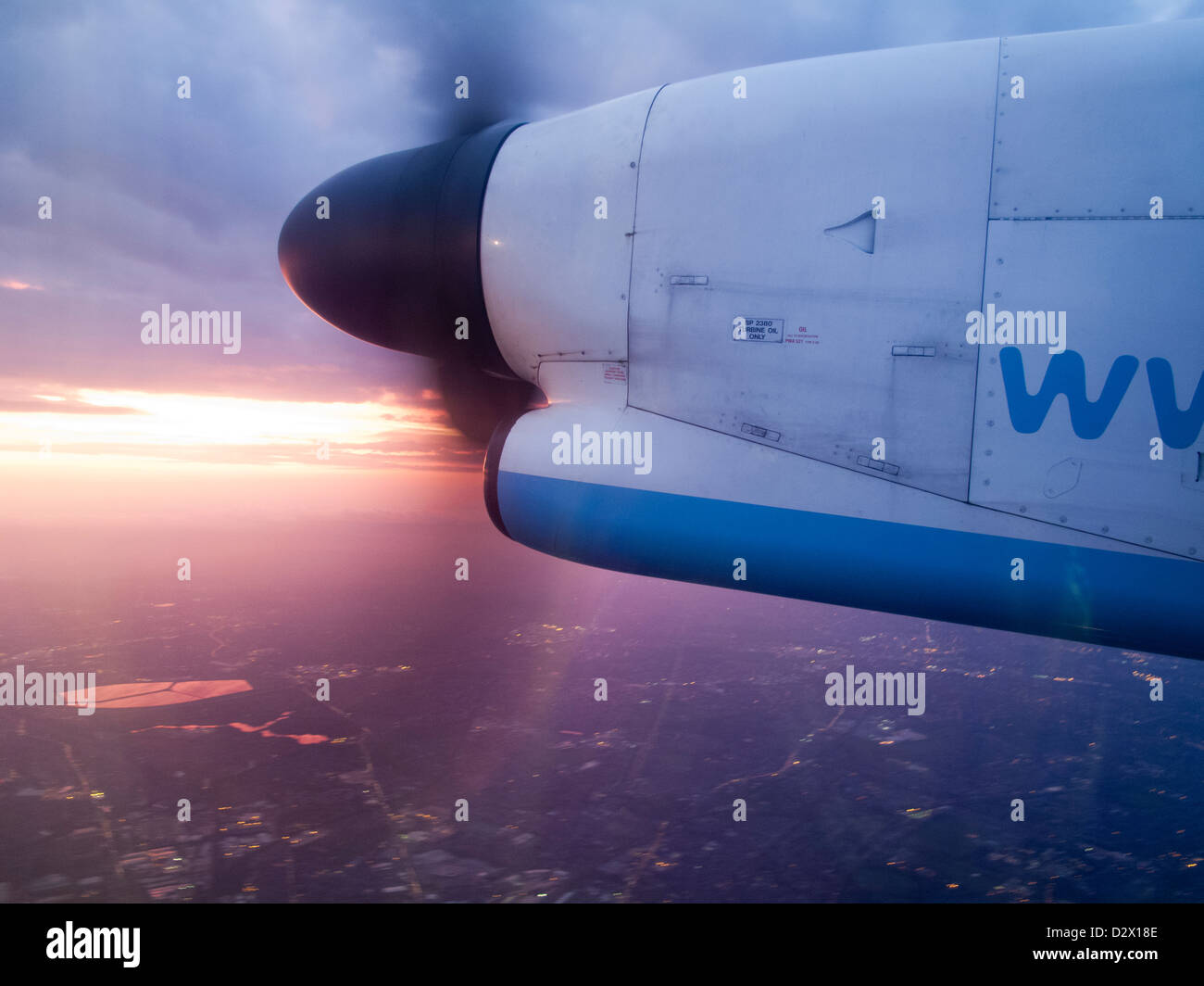 Propeller Jet engine with sunrise taken from inside aircraft Stock ...