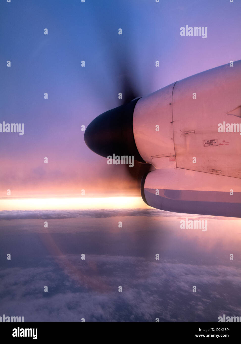 Propeller Jet engine with sunrise taken from inside aircraft Stock ...