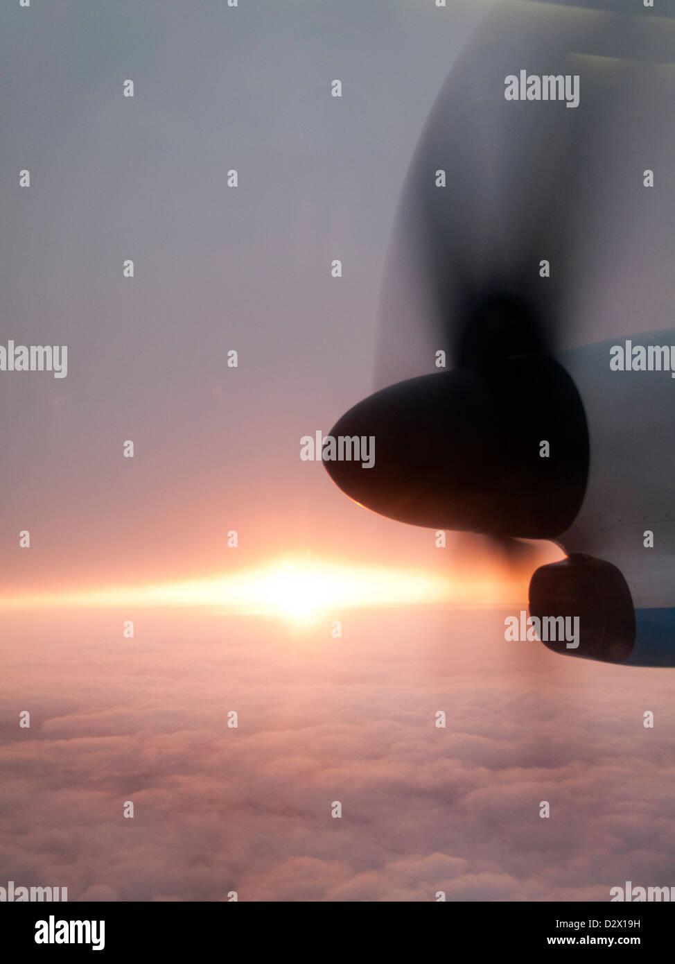 Propeller Jet engine with sunrise taken from inside aircraft Stock ...