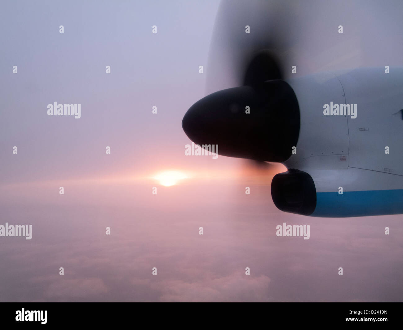 Propeller Jet engine with sunrise taken from inside aircraft Stock ...