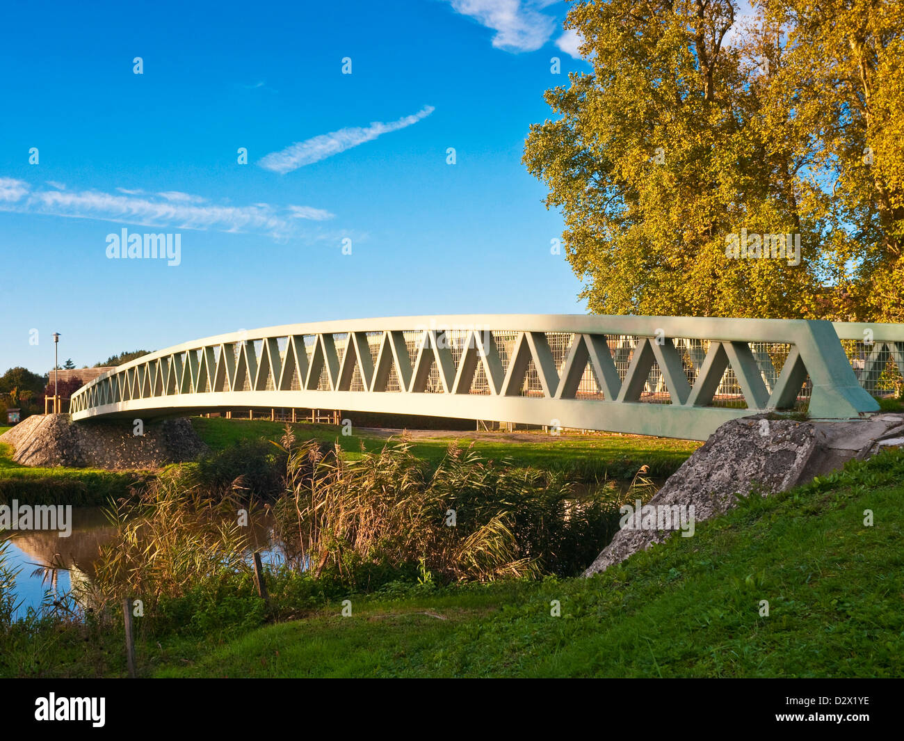 Trees river bridge footbridge hi-res stock photography and images - Alamy