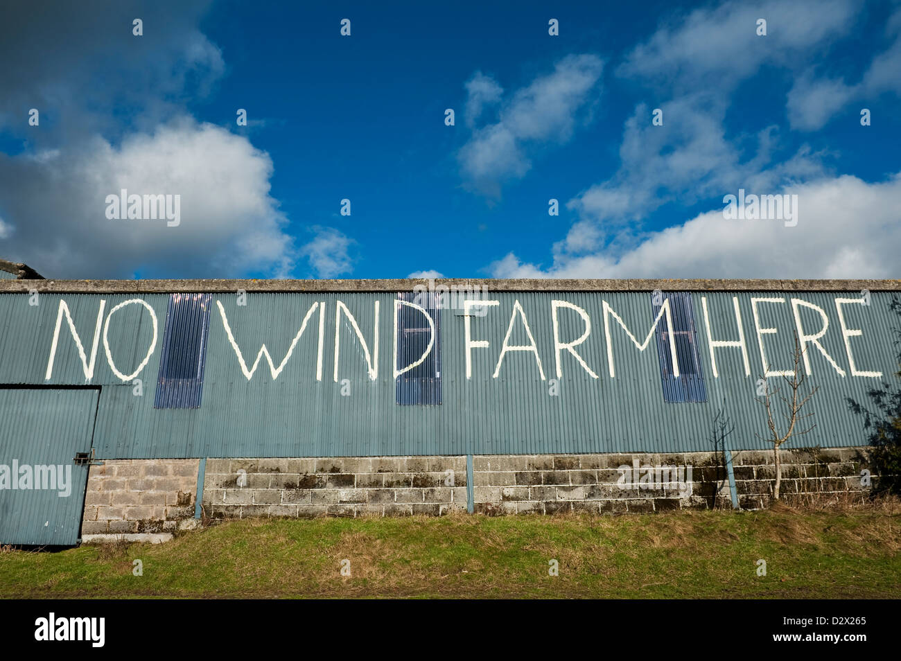 Anti wind farm slogan painted on the side of a barn near a proposed ...