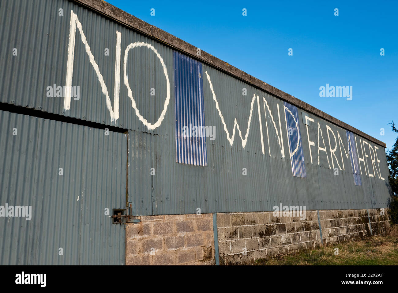 Anti wind farm slogan painted on the side of a barn near a proposed ...