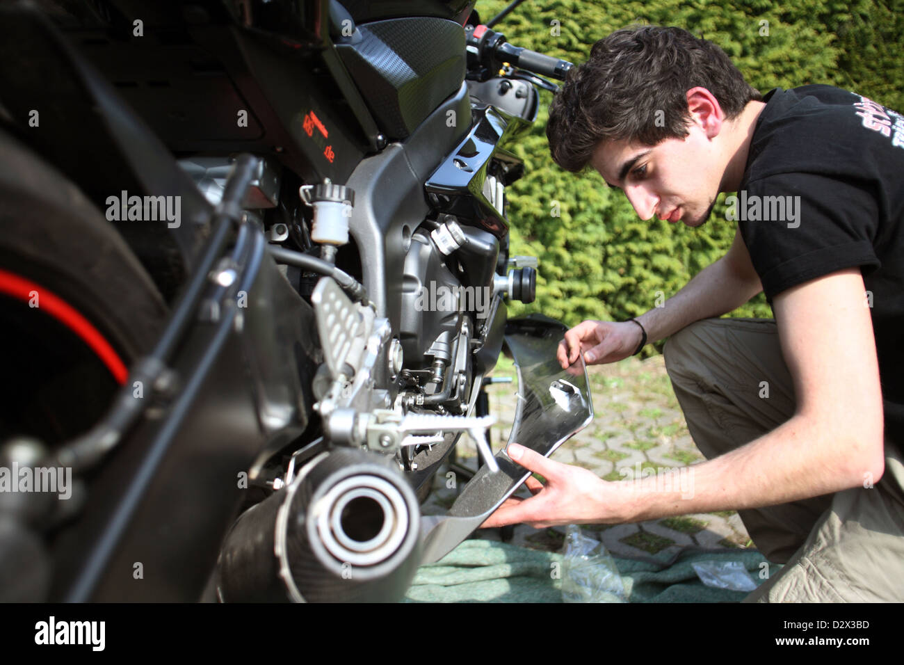 Berlin, Germany, a man working on a motorcycle Yamaha R6 Stock Photo ...