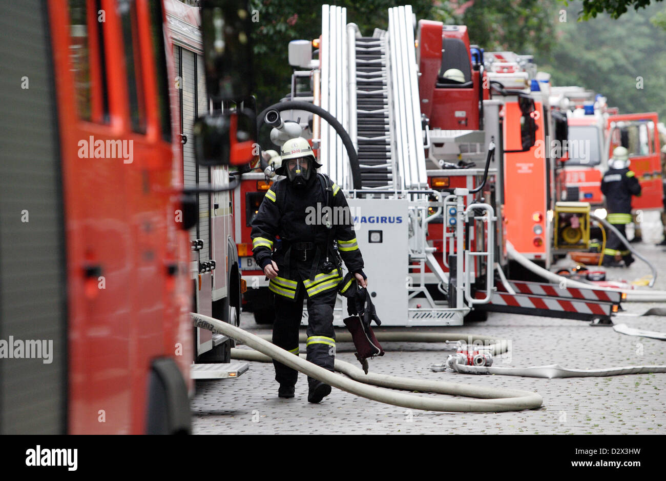 Berlin, Germany, a firefighter with the use of respiratory protection ...