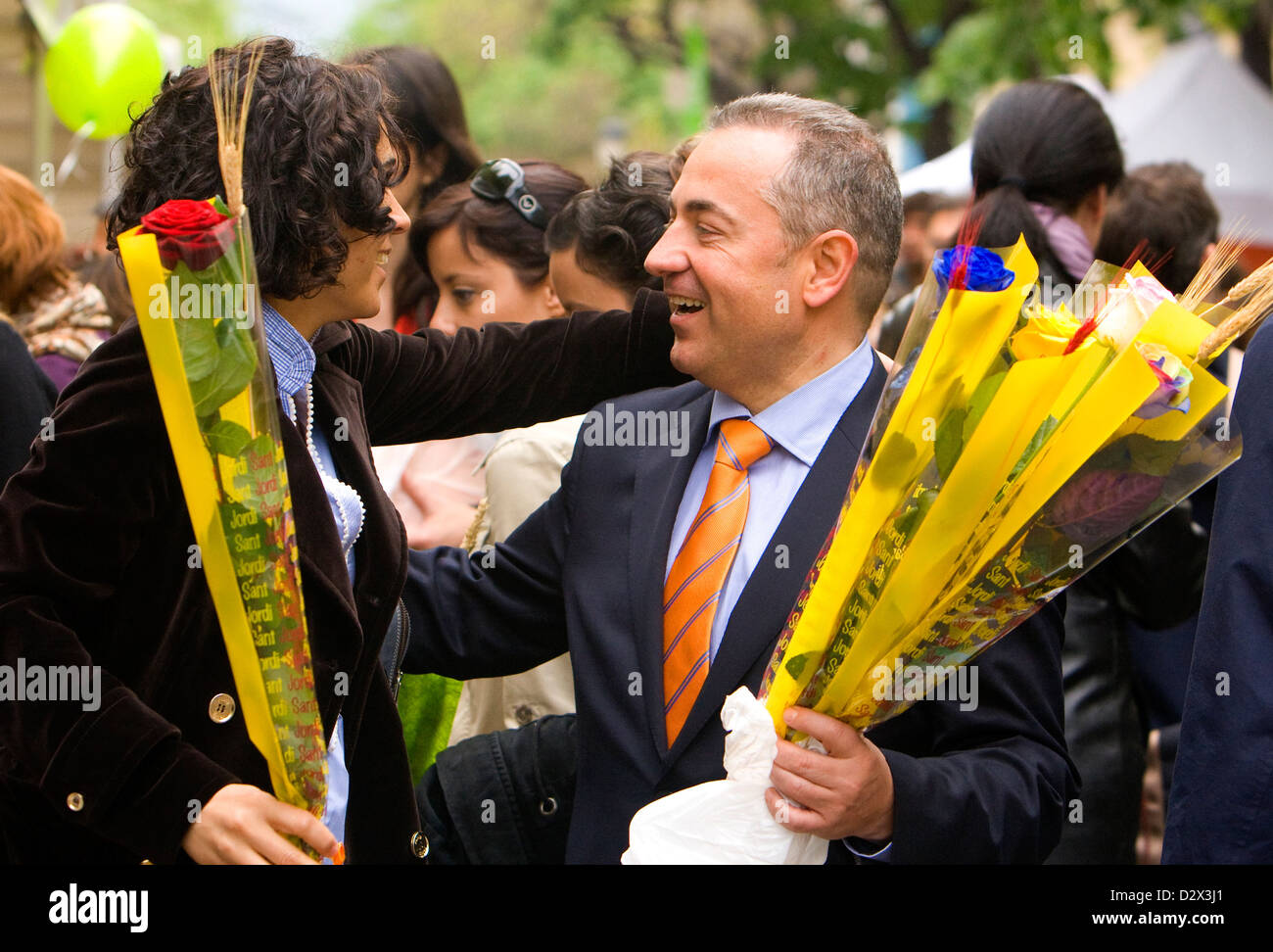 Barcelona, Spain, people hug each other on the road at Sant Jordi day ...