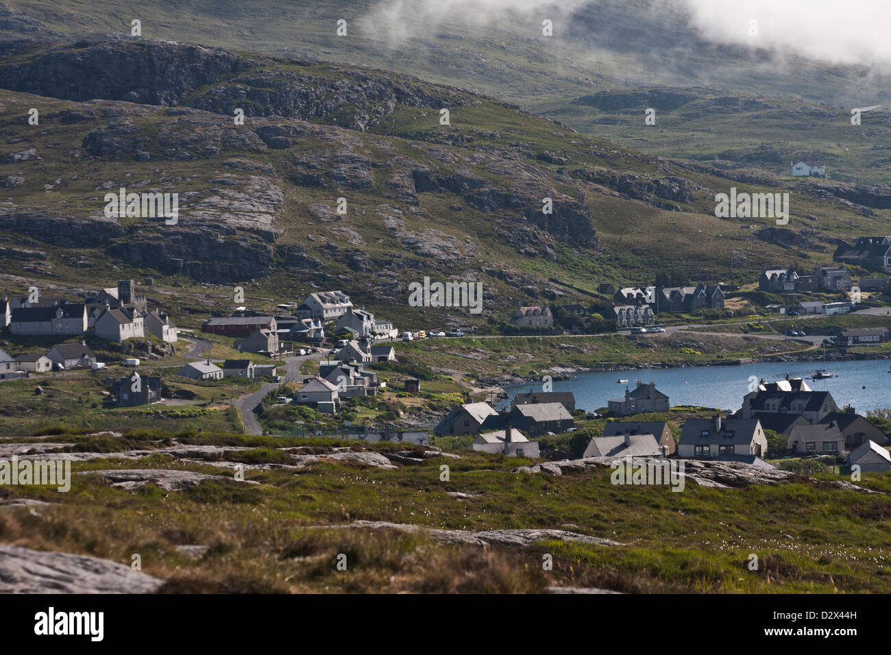 The town of Castlebay sits under Heaval Mountain on the Isle of Barra ...