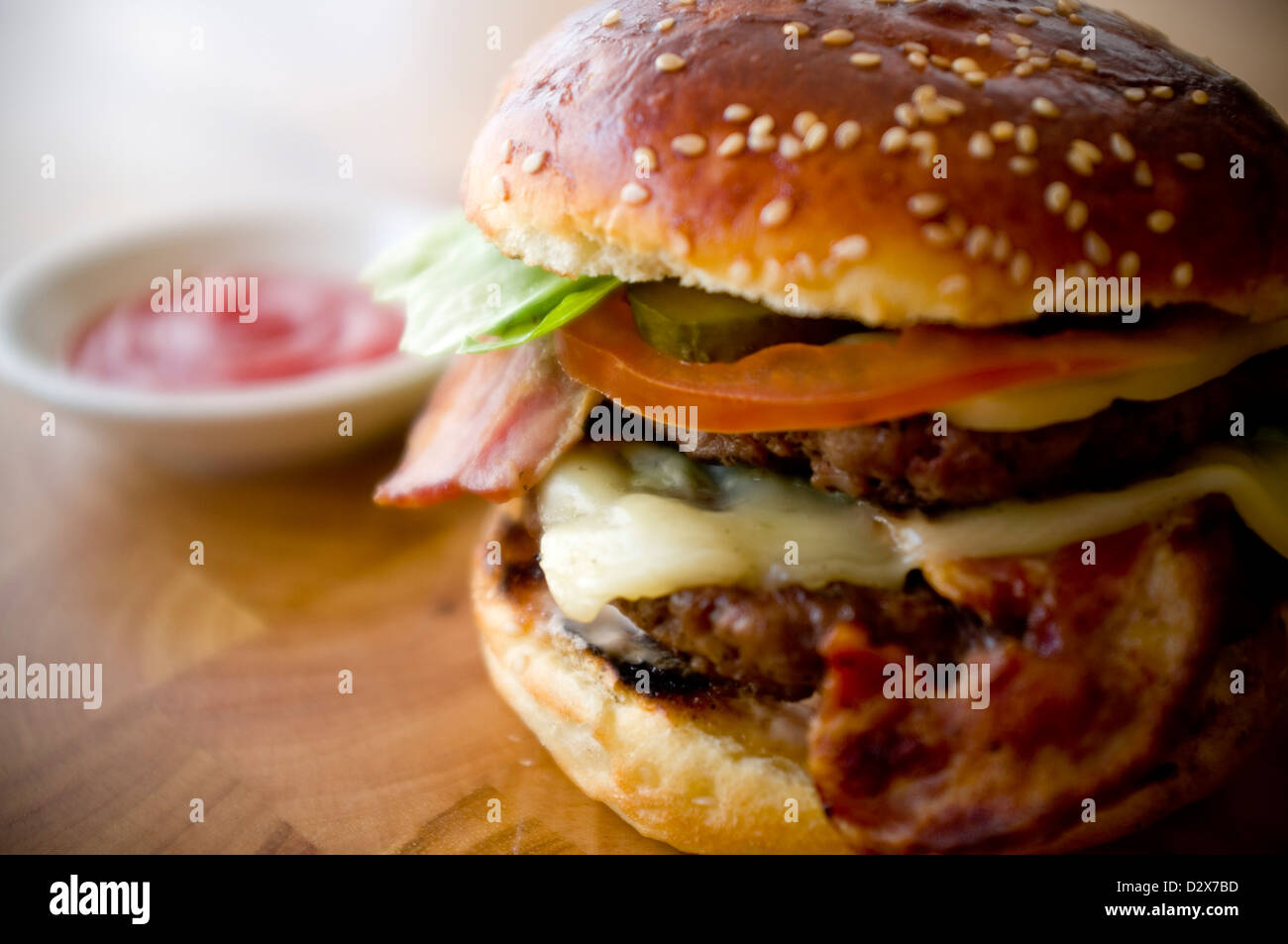 Double Cheese - Two burgers, layered with cheese, bacon, tomato ...