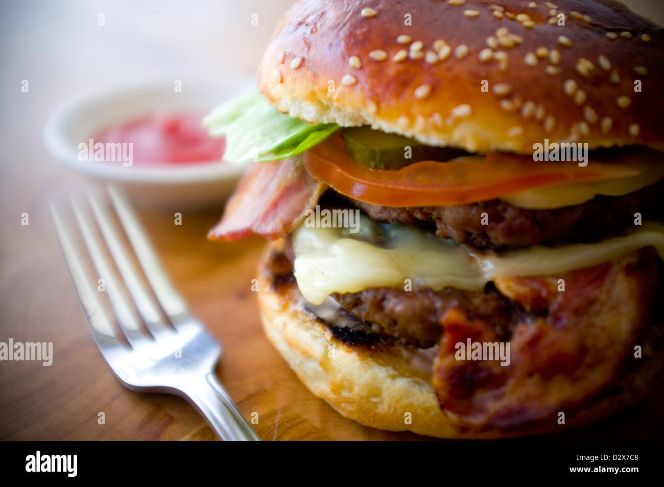 Double Cheese - Two burgers, layered with cheese, bacon, tomato ...