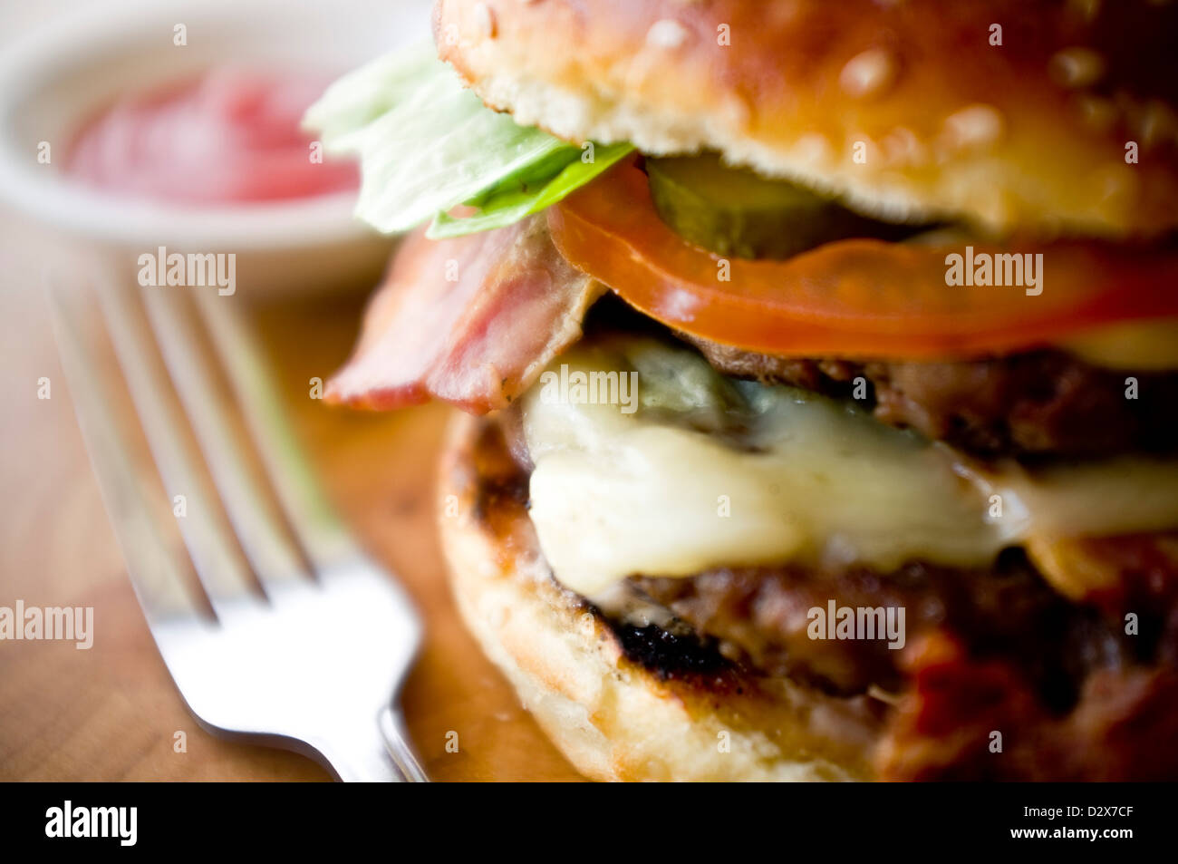 Double Cheese - Two burgers, layered with cheese, bacon, tomato ...