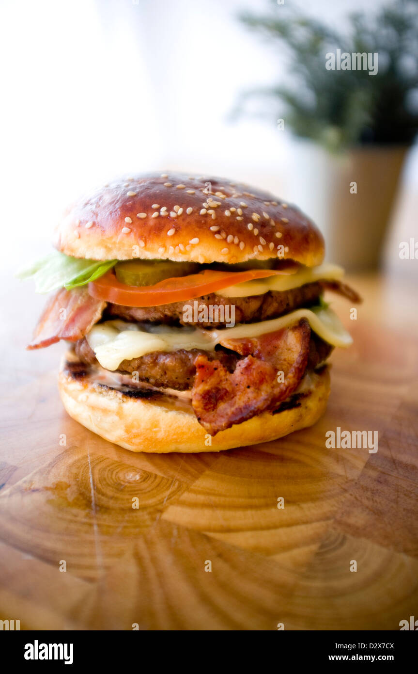 Double Cheese - Two burgers, layered with cheese, bacon, tomato ...