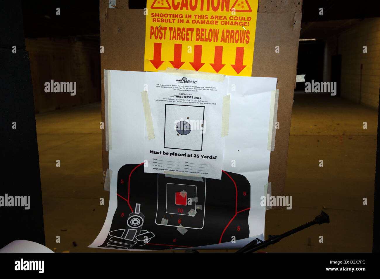 Target shooting with an AR-style target rifle at an indoor range Stock ...