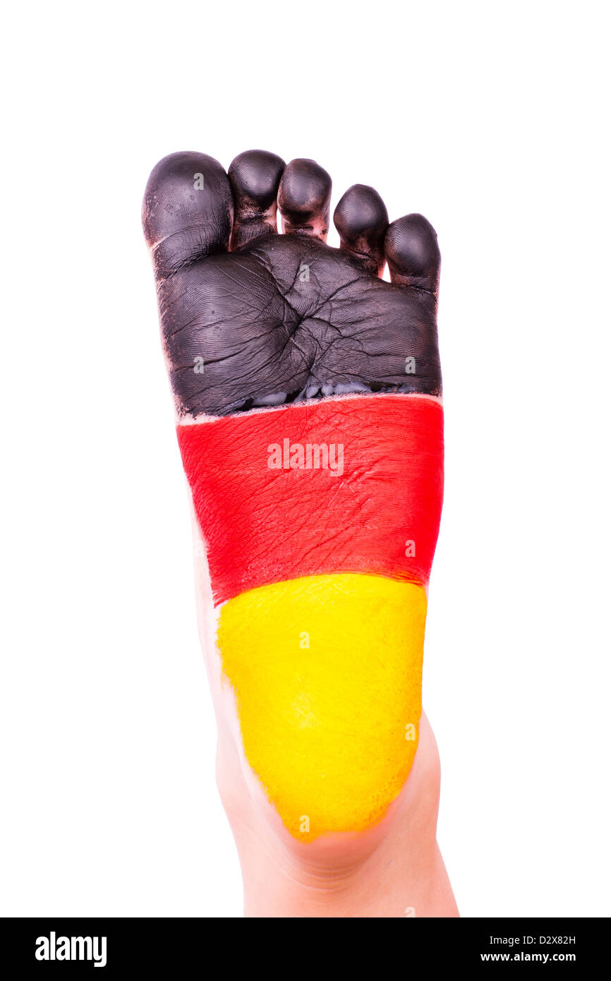 German flag on a foot isolated on white. Eurotrip. Travelling to ...
