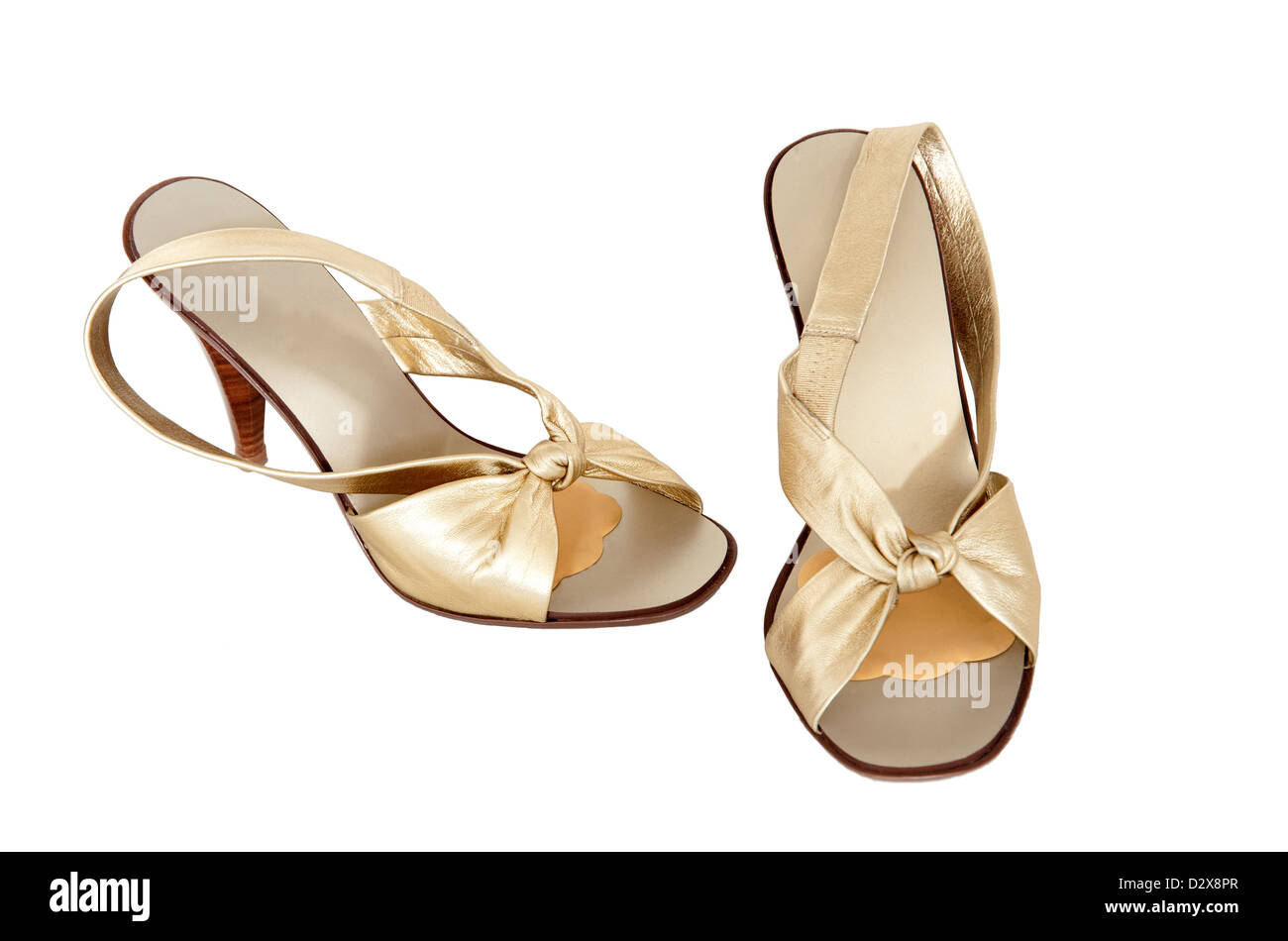 Gold open toe women's high heel shoes Stock Photo - Alamy