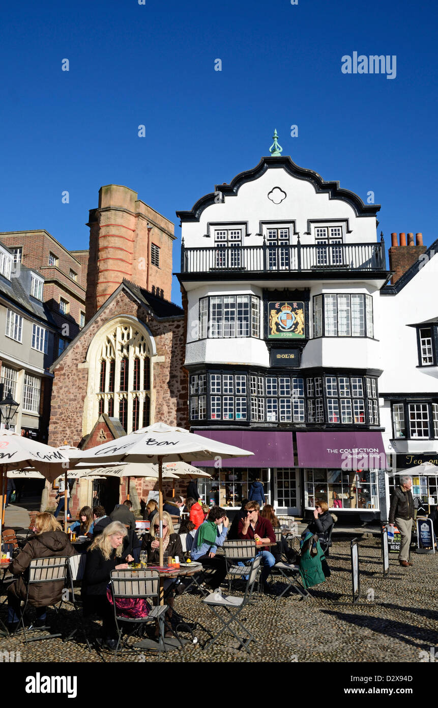 tourists having drinks sitting outside "Mols " coffee shop in cathedral ...