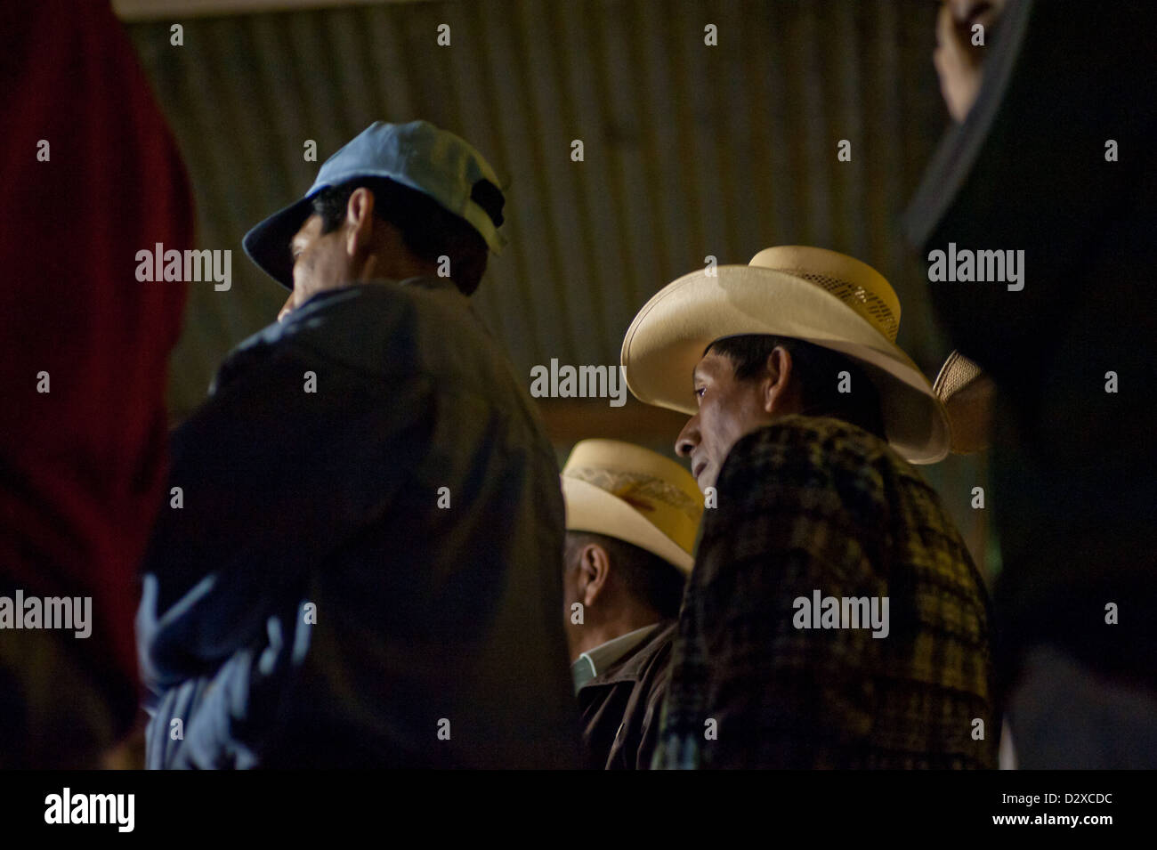 This is an image of a Guatemalan man with a cowboy hat in a crowd at ...